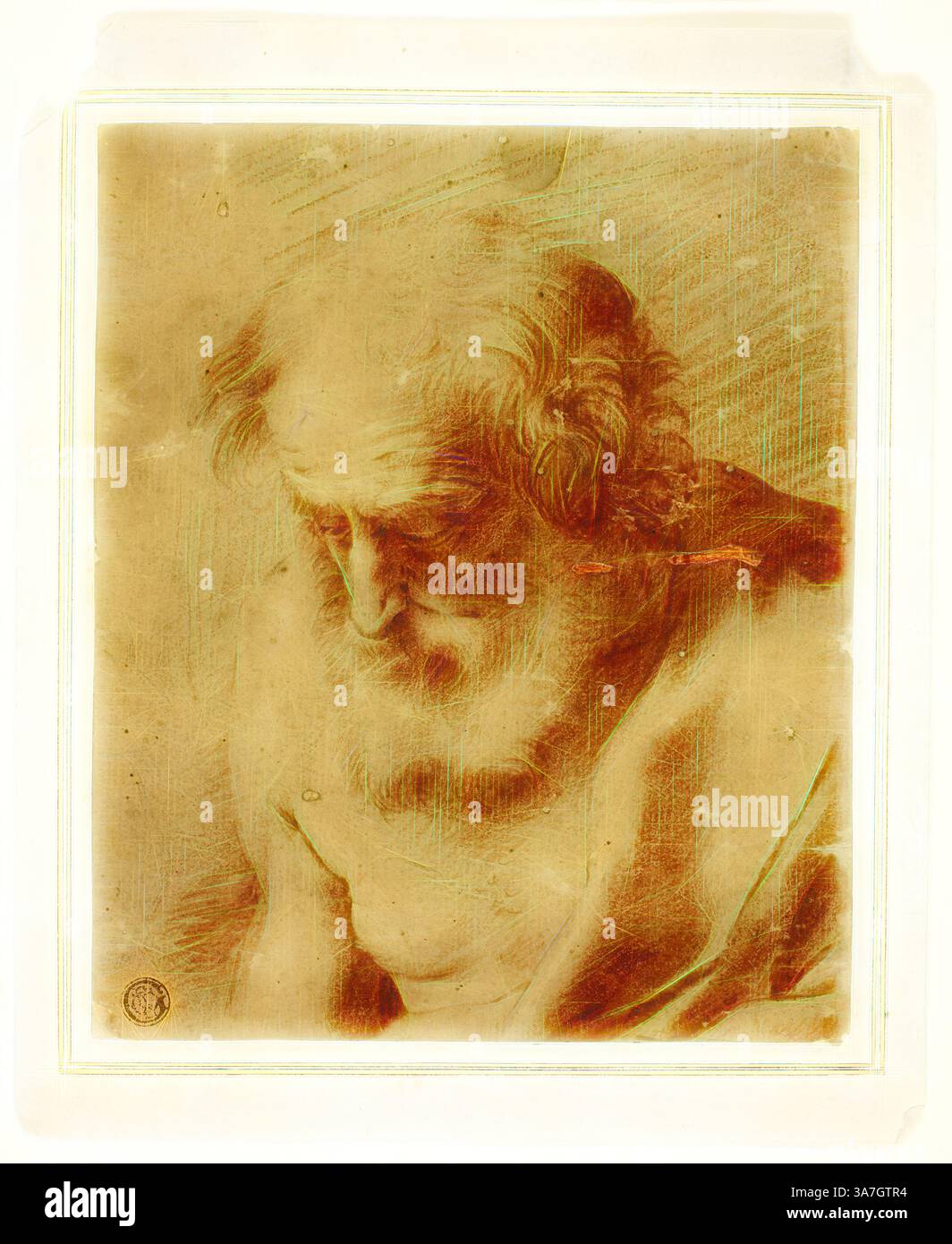 A thoughtful, elderly man with a beard is captured in deep ...