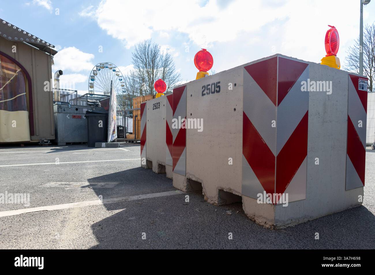 PRODUCTION - 27 March 2025, Bavaria, Würzburg: Anti-terror barriers ...