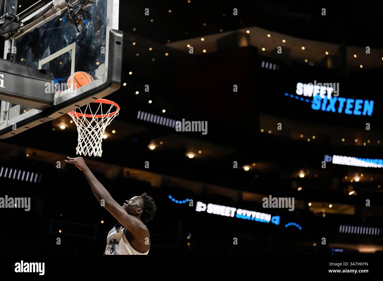 Mississippi forward John Bol (10) runs drills during practice before ...