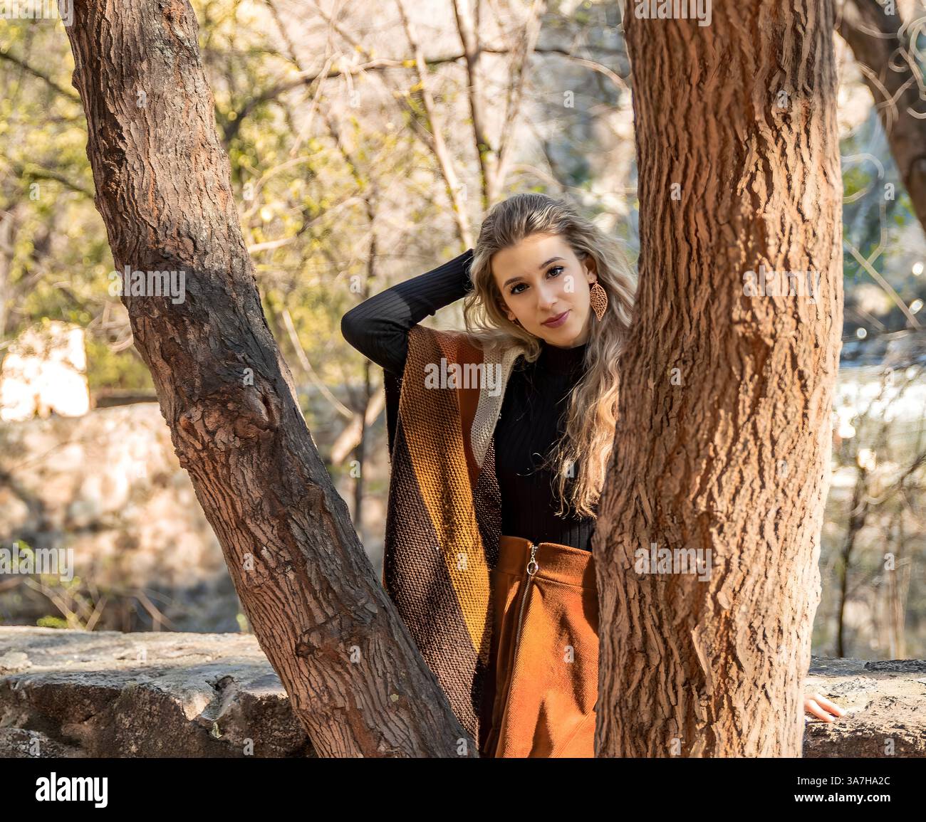 Lady in poncho hi-res stock photography and images - Alamy
