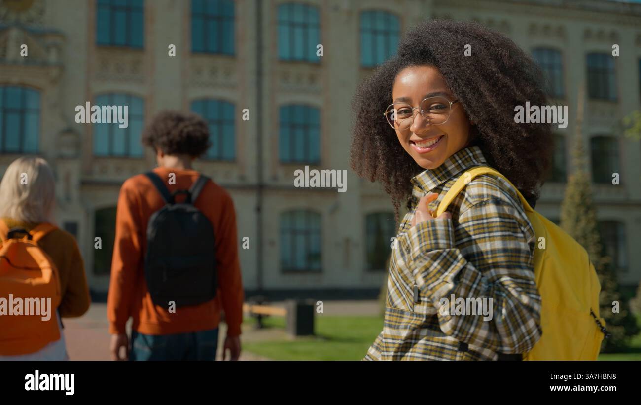 Back view from behind multiracial friends students three girls female ...