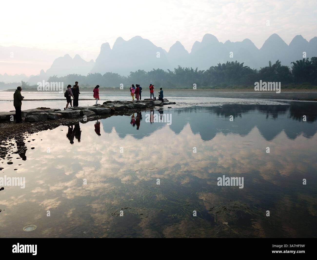 (250327) -- GUILIN, March 27, 2025 (Xinhua) -- An aerial drone photo ...