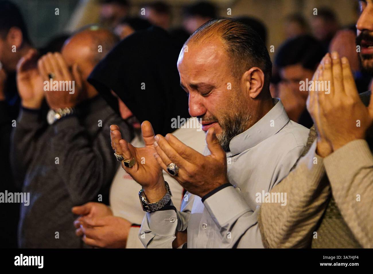 March 27, 2025, Mosul, Nineveh, Iraq: A Sunni Muslim man cries during ...