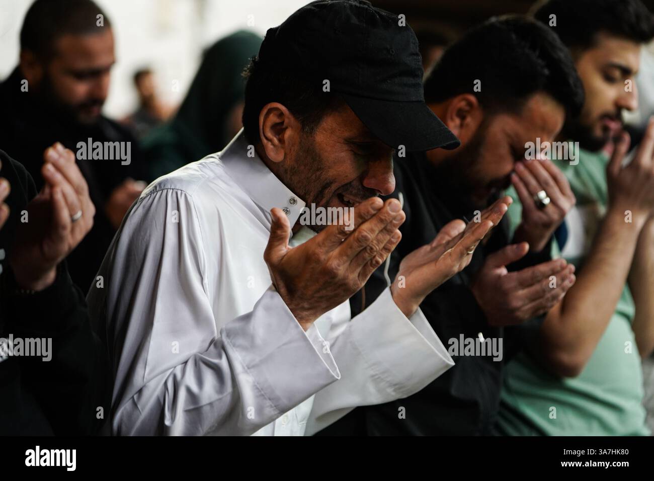 March 27, 2025, Mosul, Nineveh, Iraq: A Sunni Muslim man cries during ...