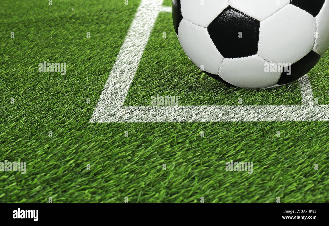 Football field with markings and soccer ball on green turf Stock Photo ...