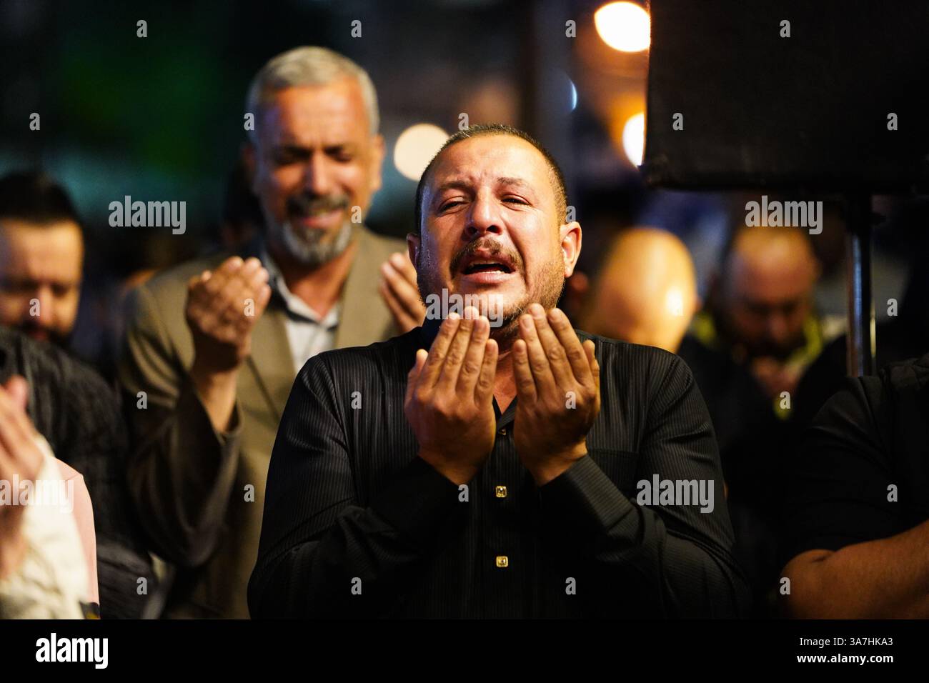 March 27, 2025, Mosul, Nineveh, Iraq: A Sunni Muslim man cries during ...