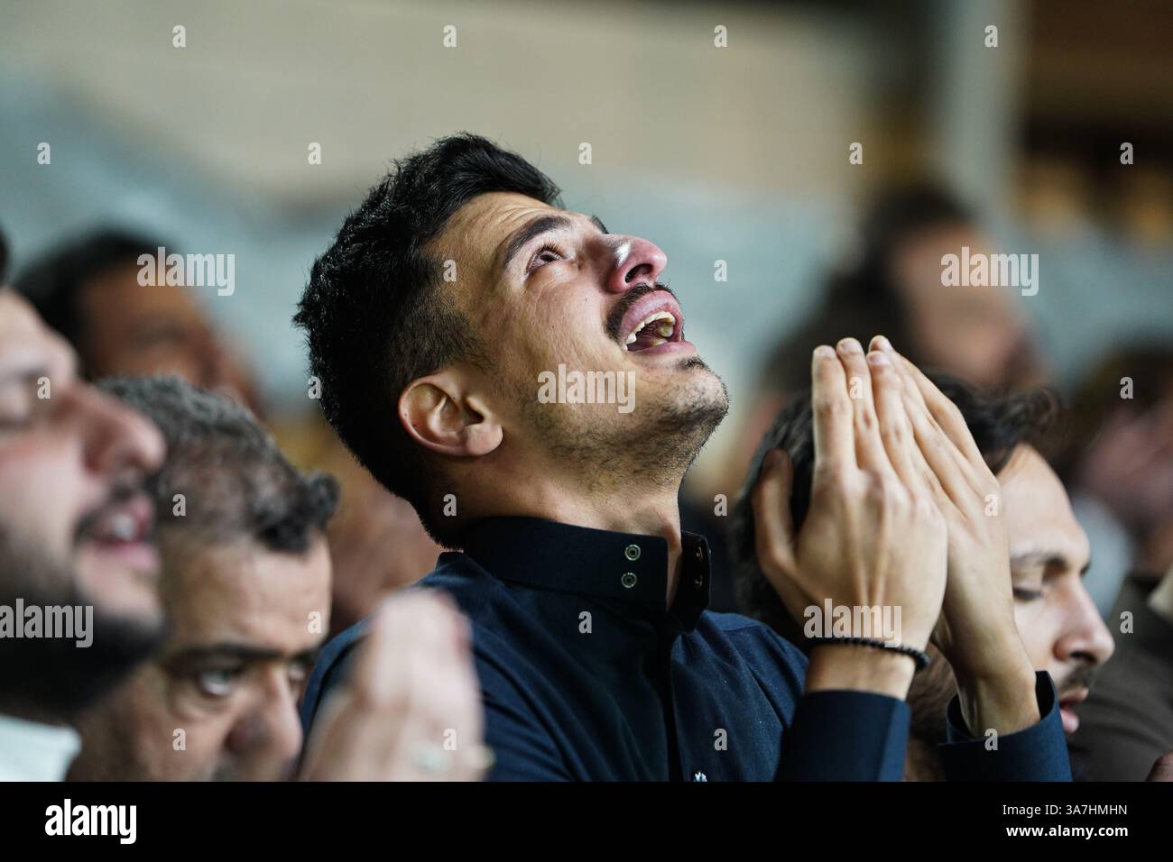 Mosul, Nineveh, Iraq. 27th Mar, 2025. A Sunni Muslim man cries during ...