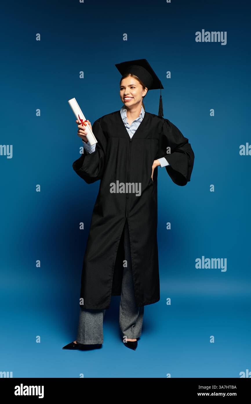 Young beautiful woman proudly poses with her diploma, radiating joy and ...
