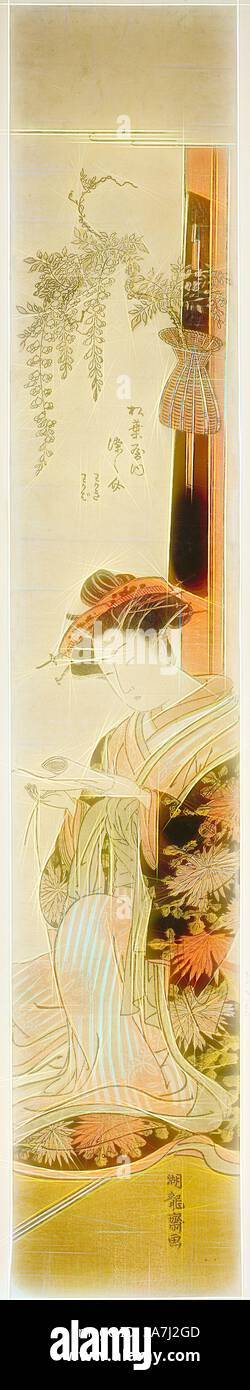 Graceful figure in traditional attire delicately holds hi-res stock ...