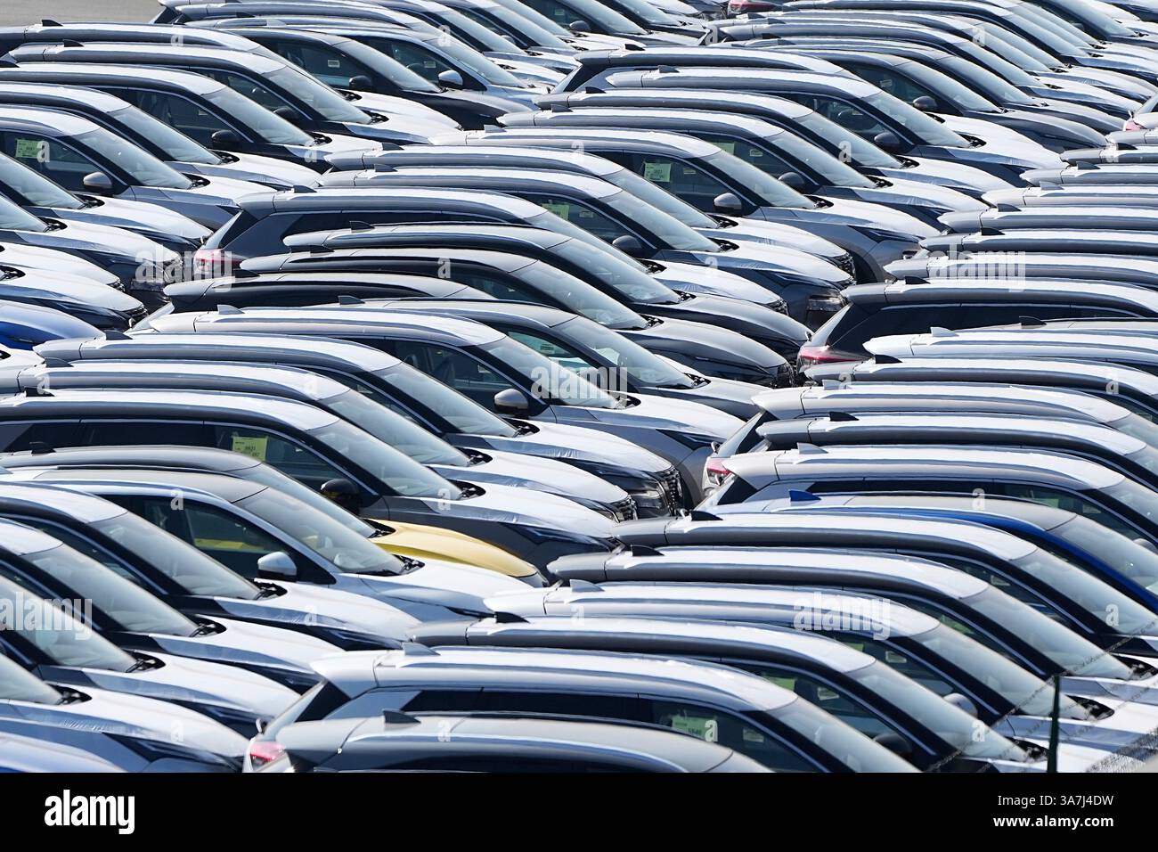 New German cars are stored at a logistic center in Duisburg, Germany ...