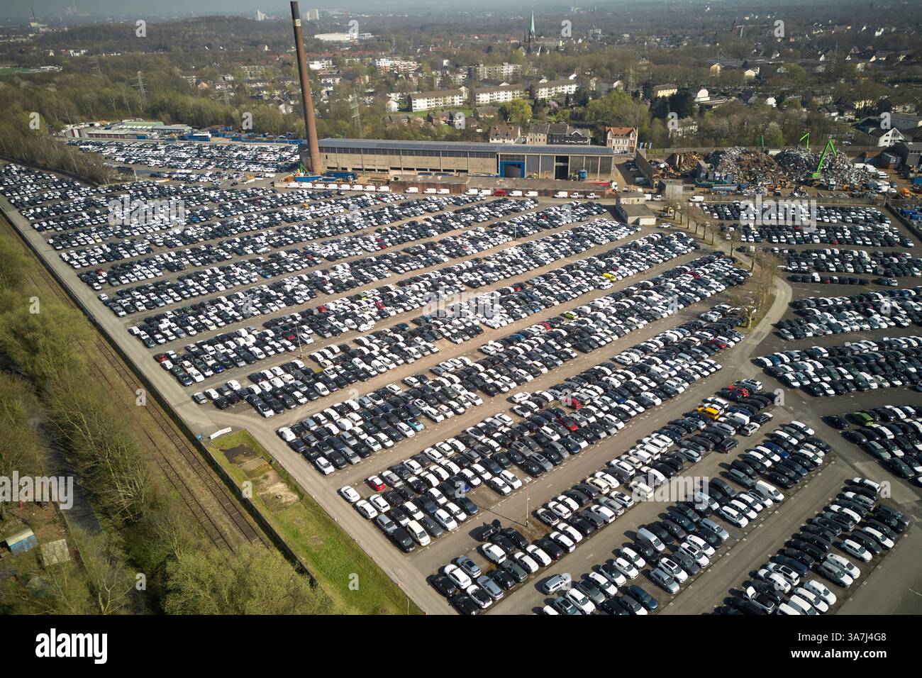 New German cars are stored at a logistic center in Essen, Germany ...