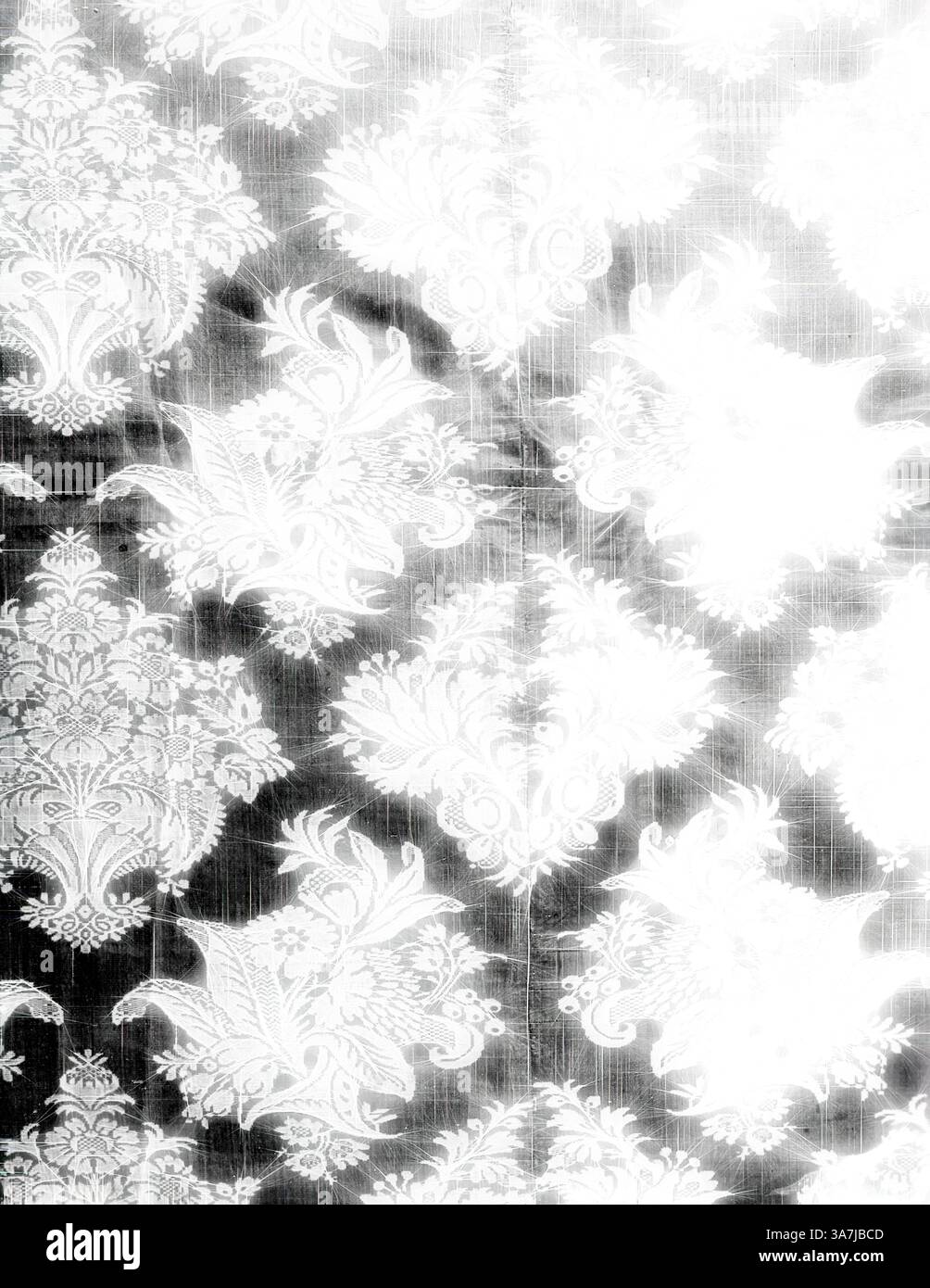 An intricate pattern of swirling floral motifs, layered with textures ...