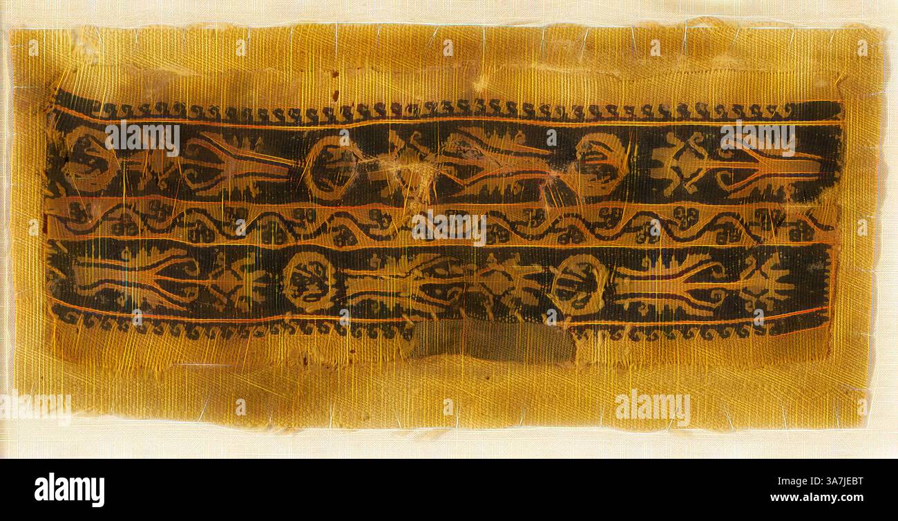 An intricate textile featuring elaborate patterns and motifs ...