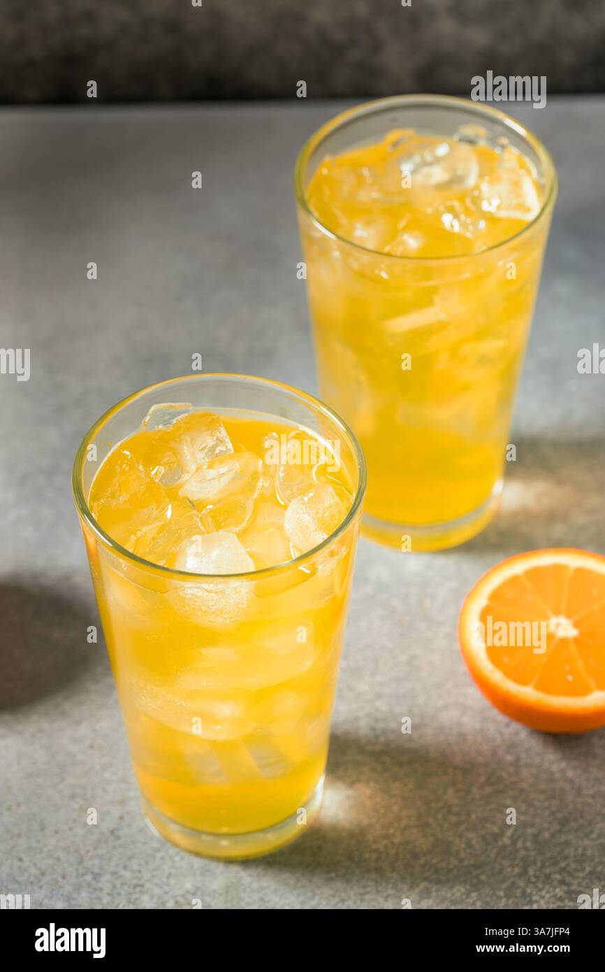 Sweet Bubbly Refreshing Orange Soda in a Glass Stock Photo - Alamy