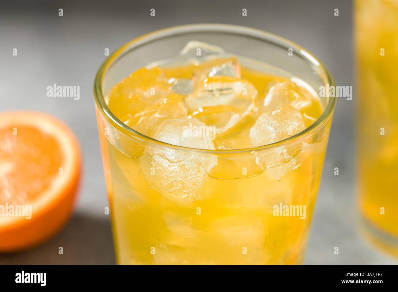 Sweet Bubbly Refreshing Orange Soda in a Glass Stock Photo - Alamy