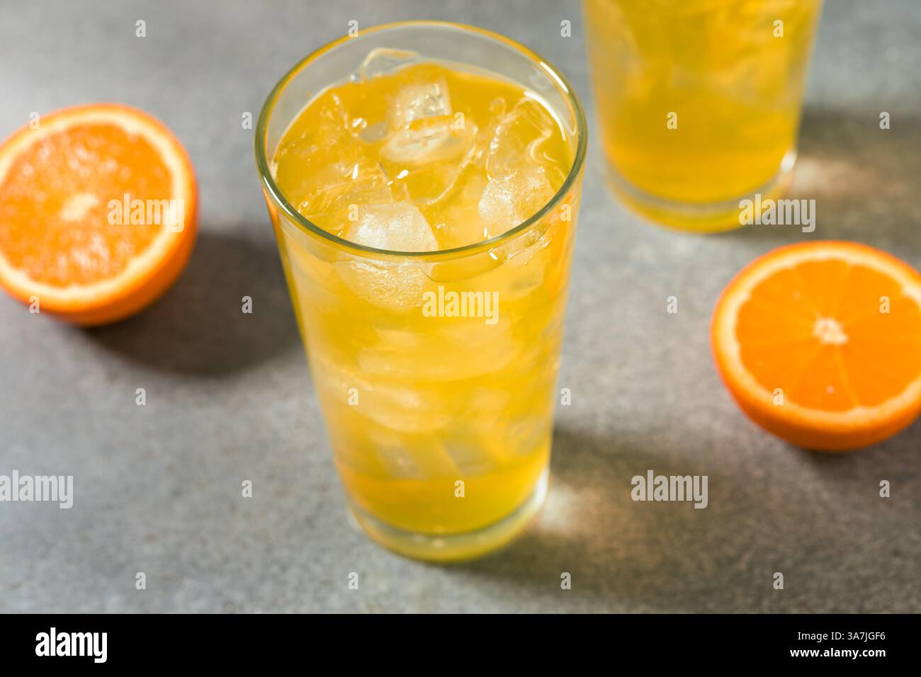 Sweet Bubbly Refreshing Orange Soda in a Glass Stock Photo - Alamy