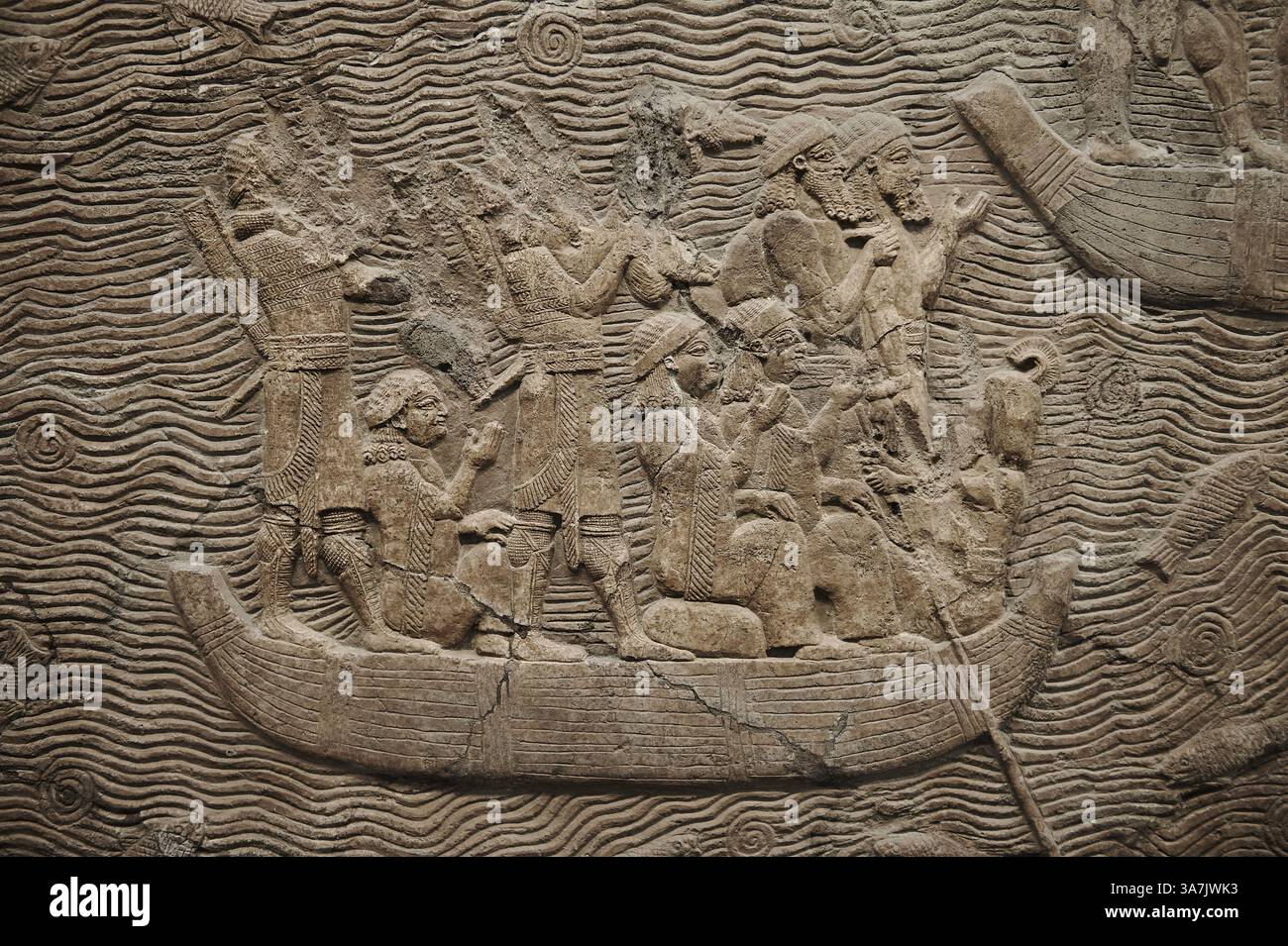 Assyrian bas relief sculpture panel showing Assyrian solders in boats ...