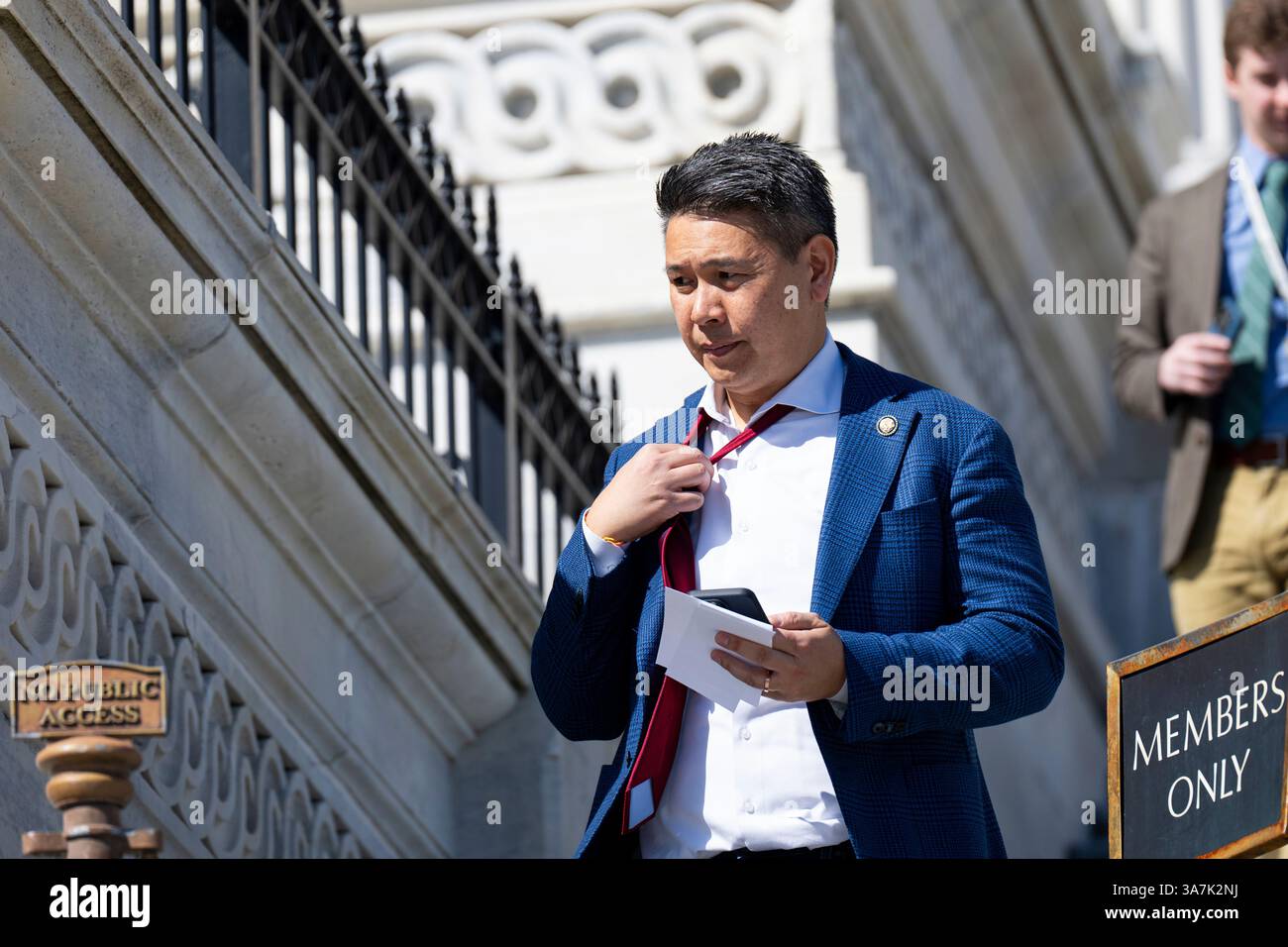 UNITED STATES - MARCH 27: Rep. Derek Tran, D-Calif., walks down the ...