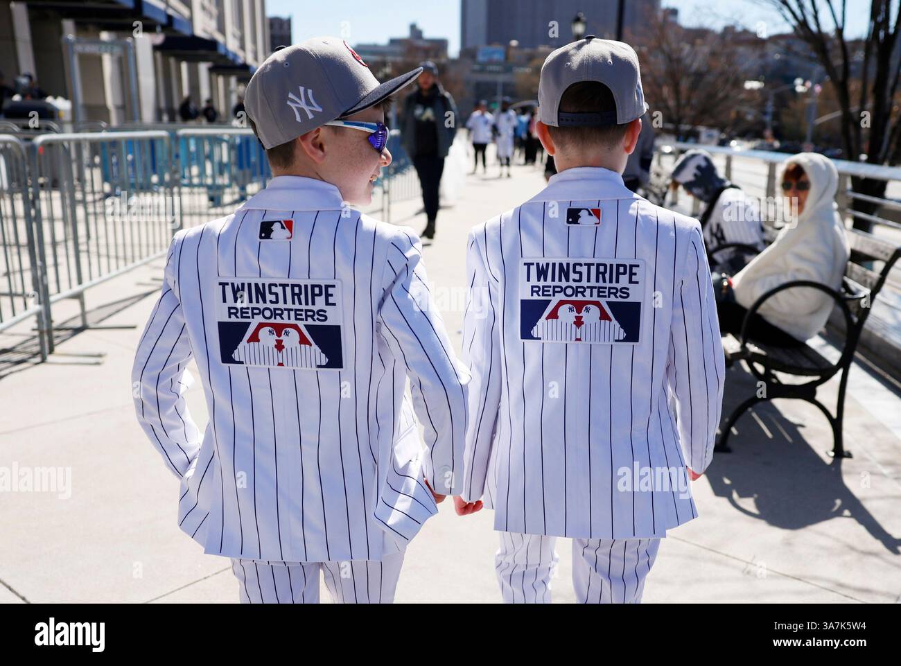 Young fans wear matching Yankees pinstripes suits before the MLB ...