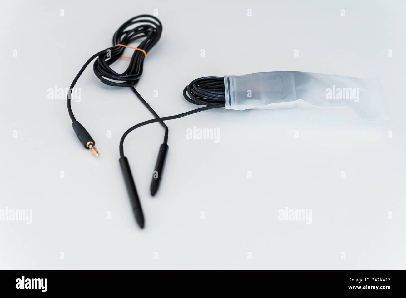 Isolated Audio Cable with Double Plug Connector Partially Stored in ...