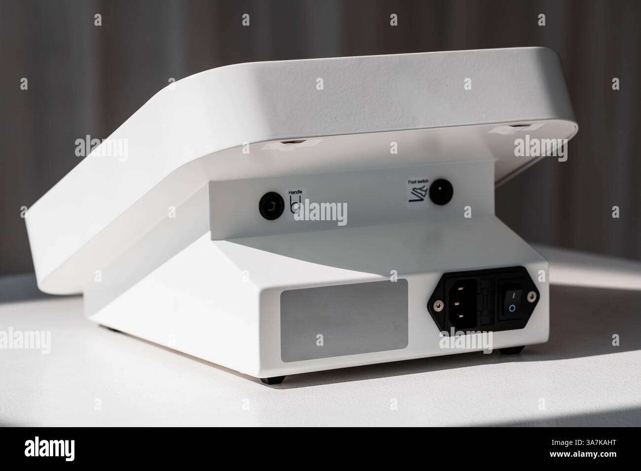 Rear View of Modern White Electronic Device on White Surface with ...