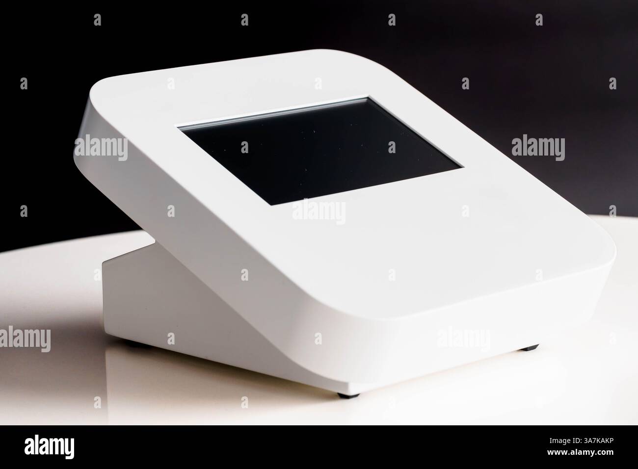 Modern Sleek White Desktop Device with Digital Touchscreen Interface on ...