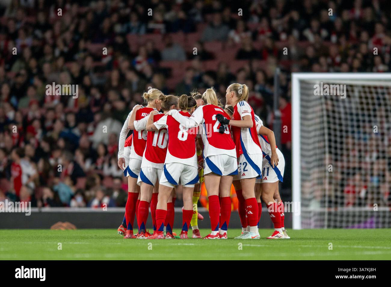 Arsenal Women huddle at the start of the Womens Champions League match ...