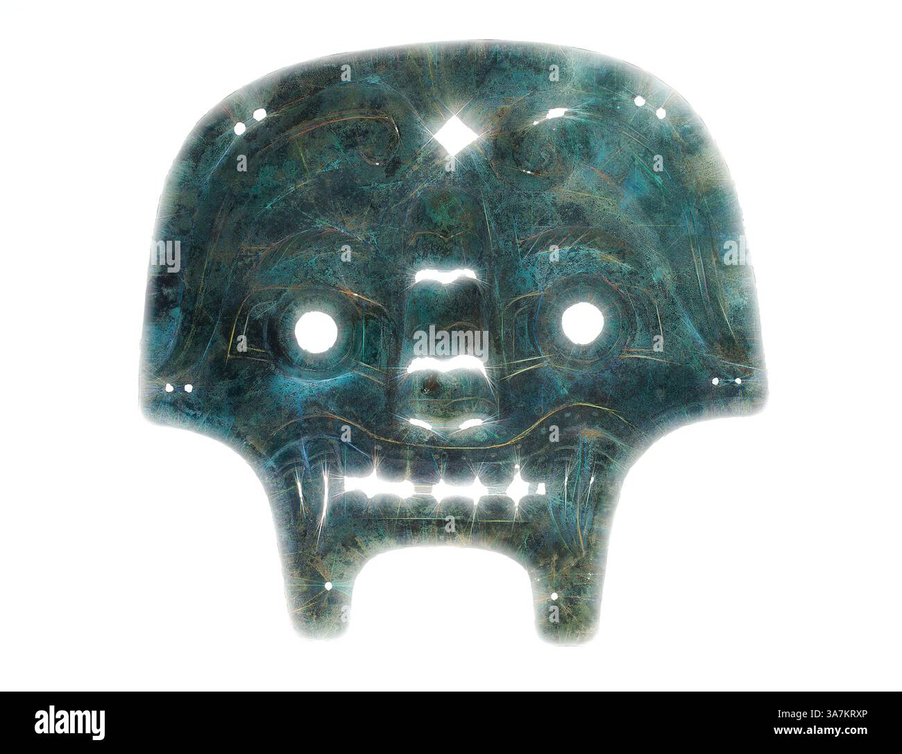 An intricately carved mask with distinct facial features and stylized ...