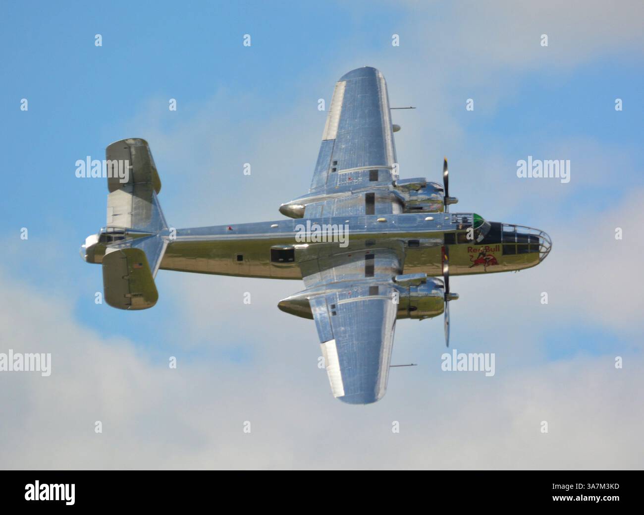 A B-25J Mitchell, a WW2 bomber, performing a flypast at an air show at ...