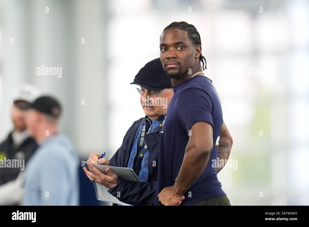 Notre Dame cornerback Benjamin Morrison (20) watches teammates during ...