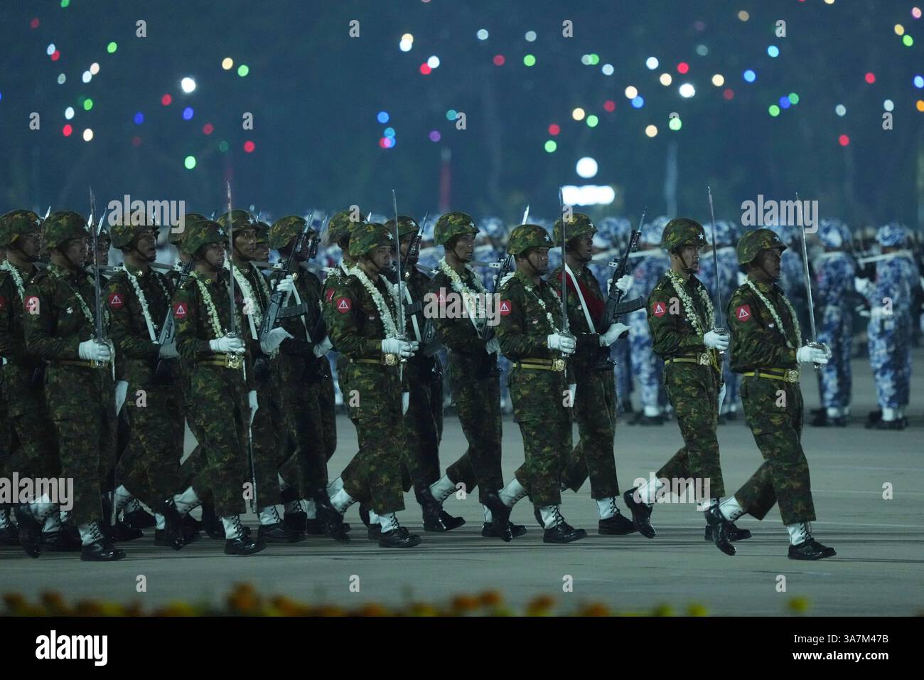 Myanmar military officers march during a parade to commemorate Myanmar ...