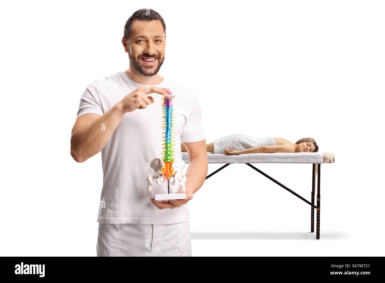 Massage therapist holding a spine model isolated on white background ...