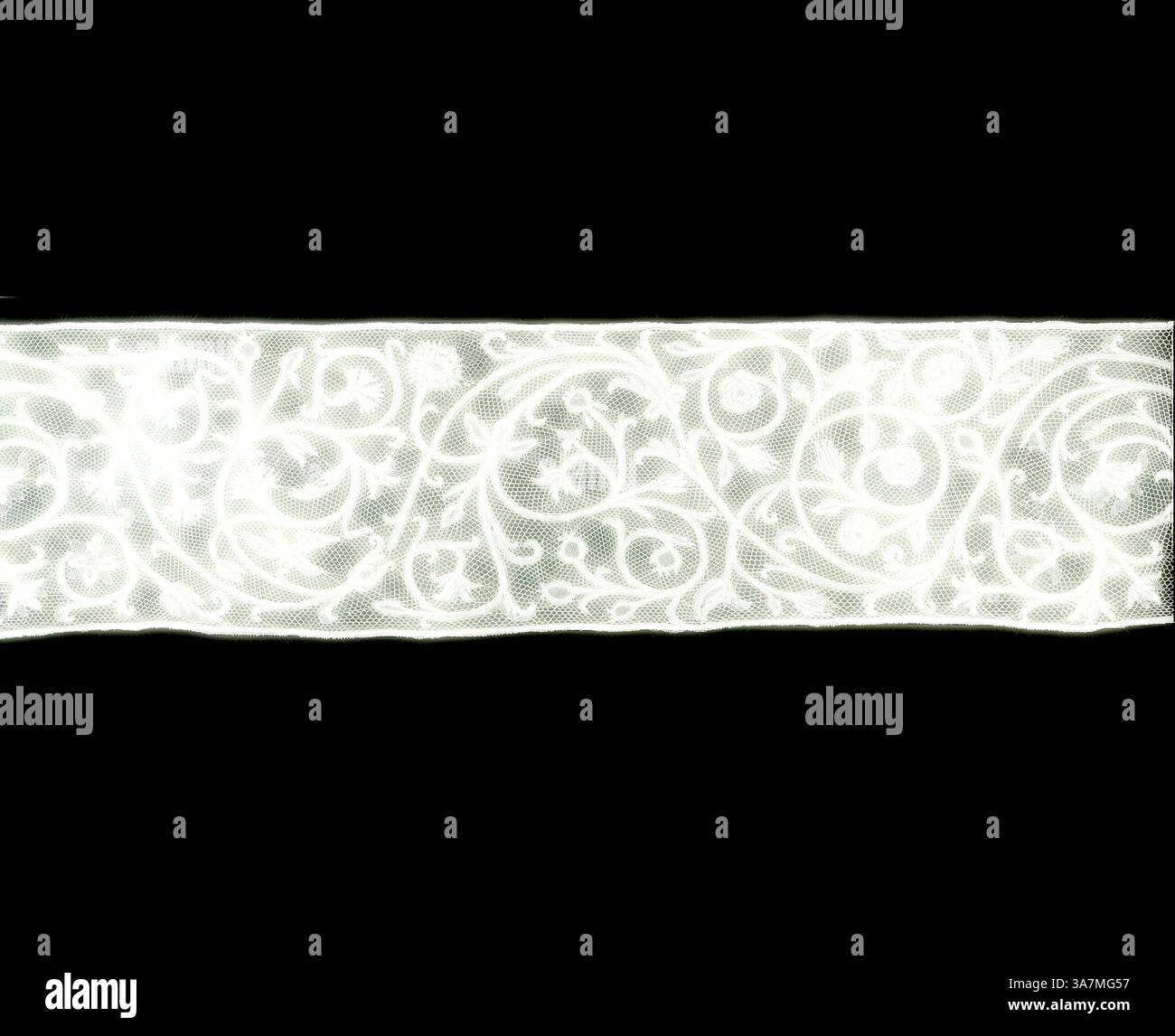 A delicate band of intricate floral patterns stretches across ...