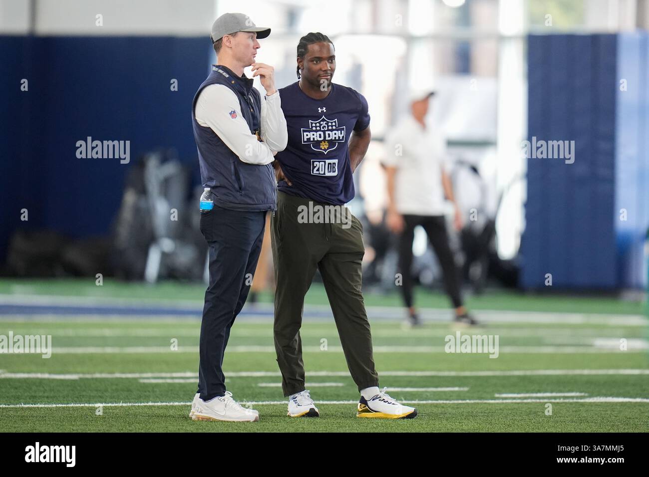 Notre Dame cornerback Benjamin Morrison, right watches teammates during ...