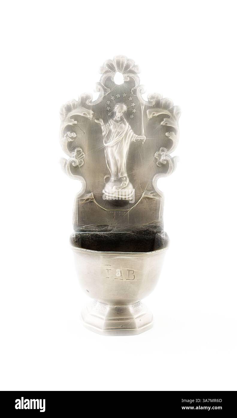 An ornate silver basin featuring a detailed depiction of a standing ...