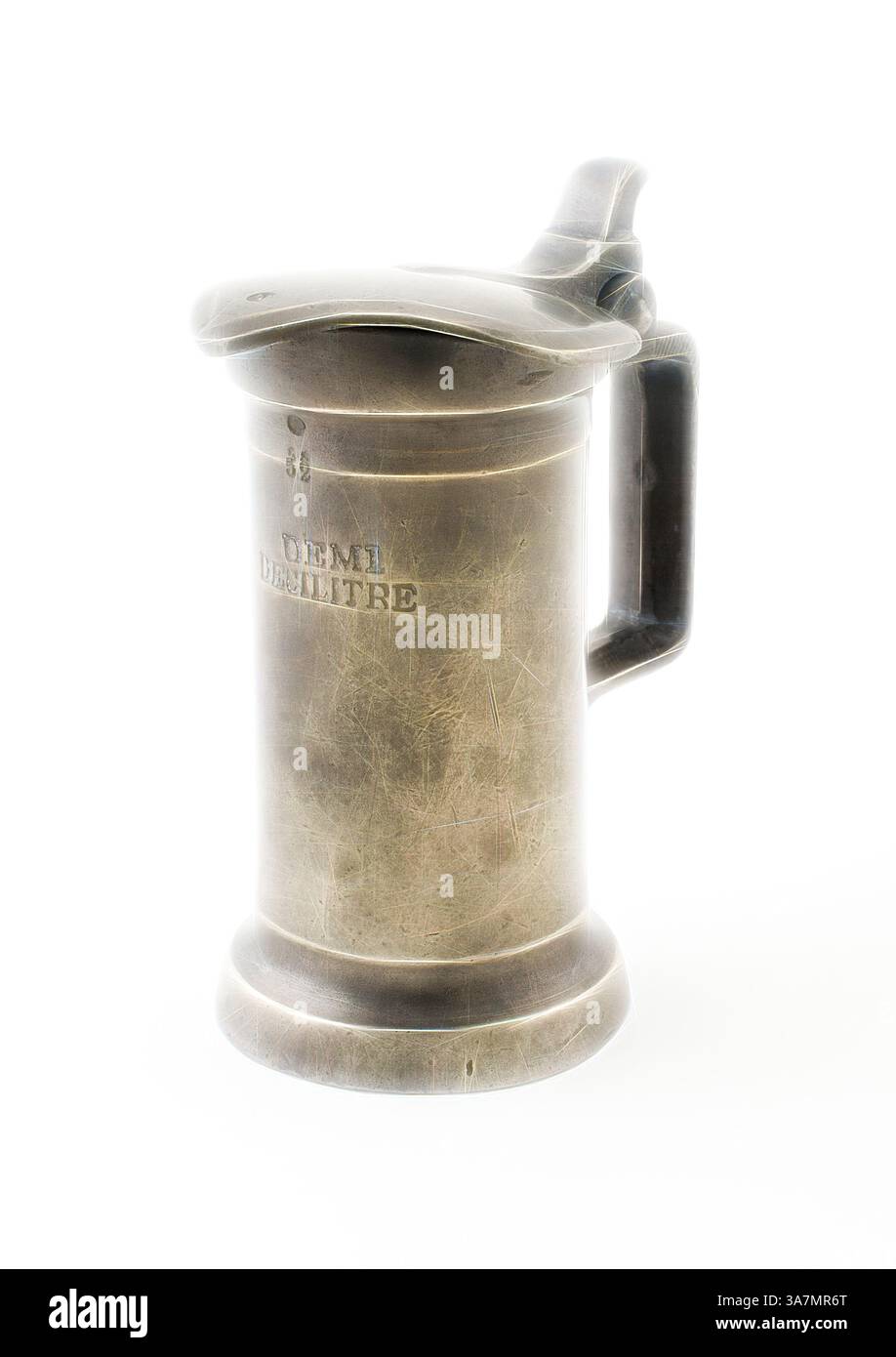 A vintage metal tankard with a hinged lid and ornate handle, featuring ...