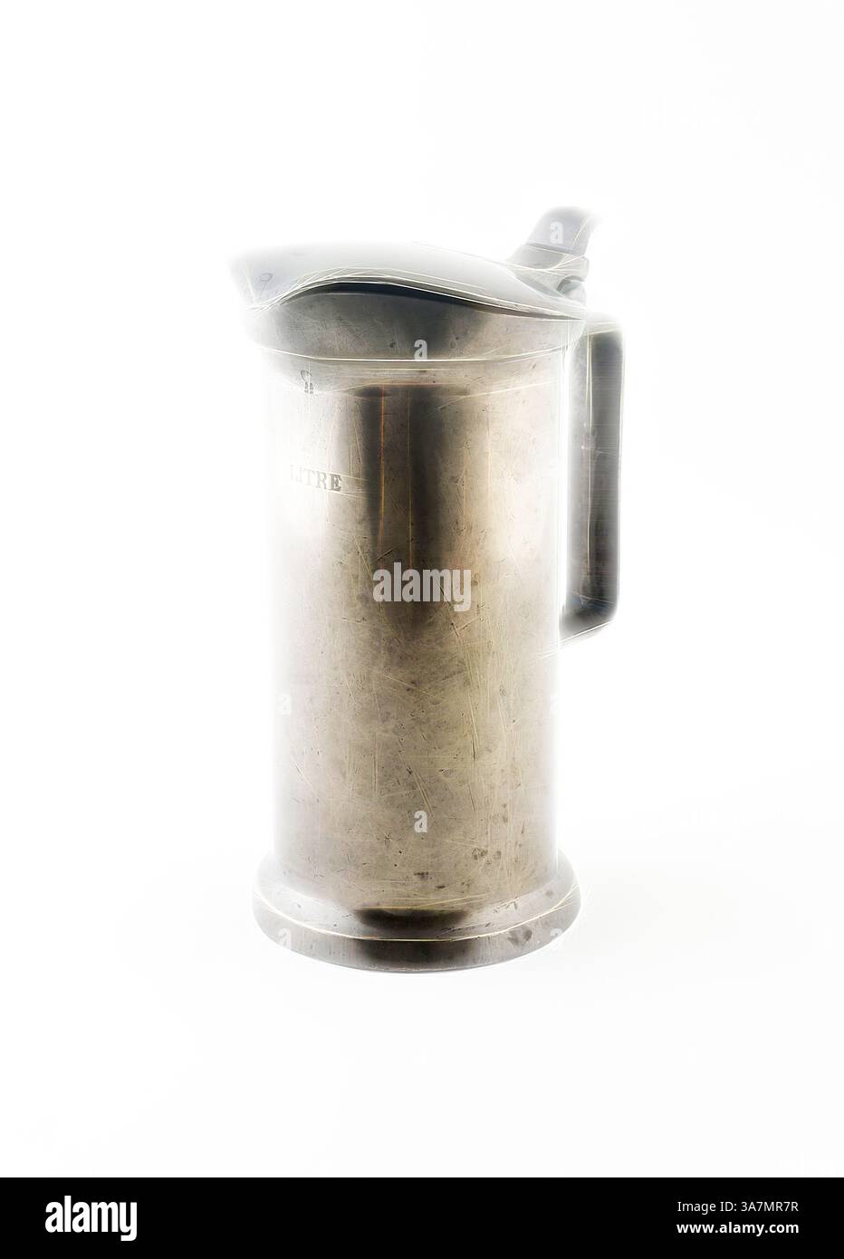 A sleek metal pitcher with a curved handle and a slightly domed lid ...