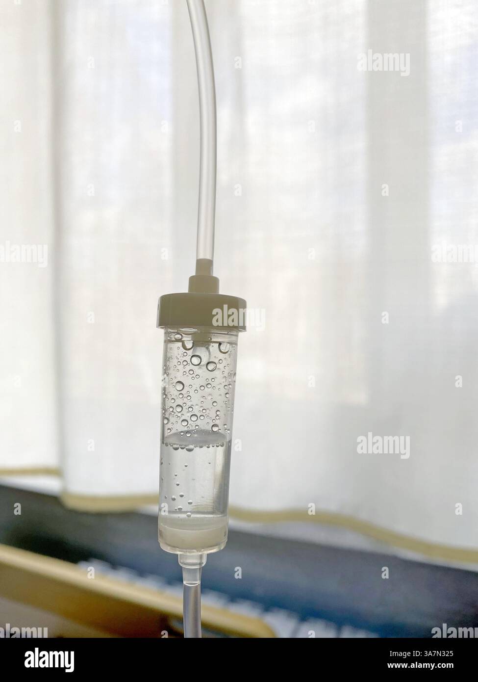 Medical drip in action in a hospital ward Stock Photo - Alamy
