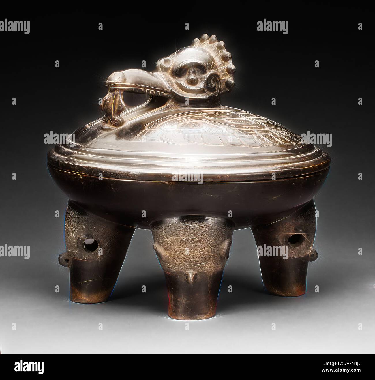 A decorative vessel featuring a stylized creature with a prominent beak ...