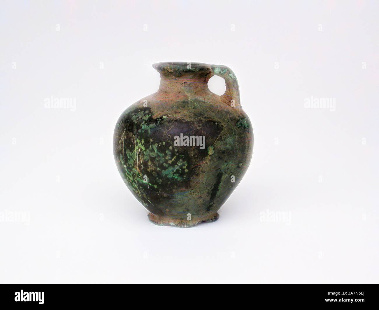 An ancient, rounded pottery jug features a unique blend of earthy tones ...