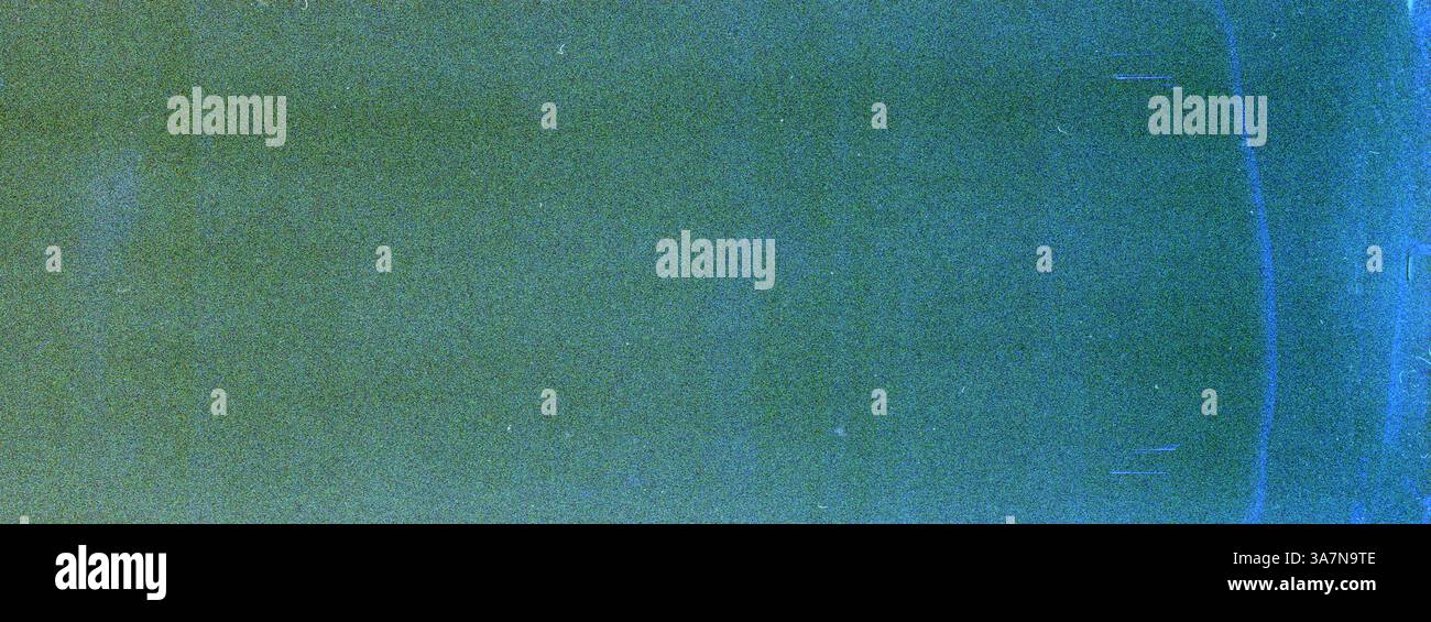 Blank grained film strip texture background with heavy grain, dust and ...