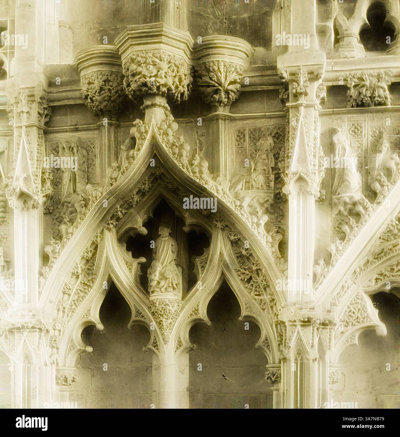 Intricate stone carvings adorn a gothic architectural feature ...
