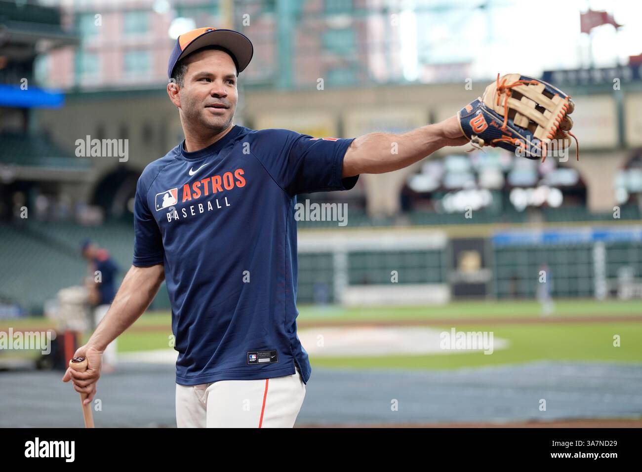 Houston Astros left fielder Jose Altuve waves as he walks to the ...