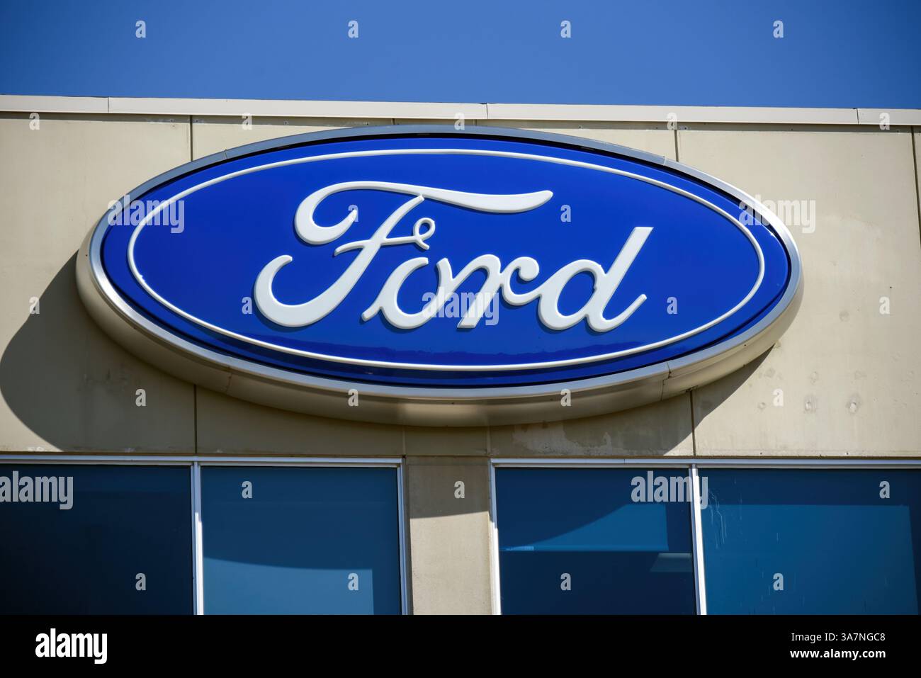 Ottawa, Canada - March 27, 2025: Ford logo on corporate office in ...