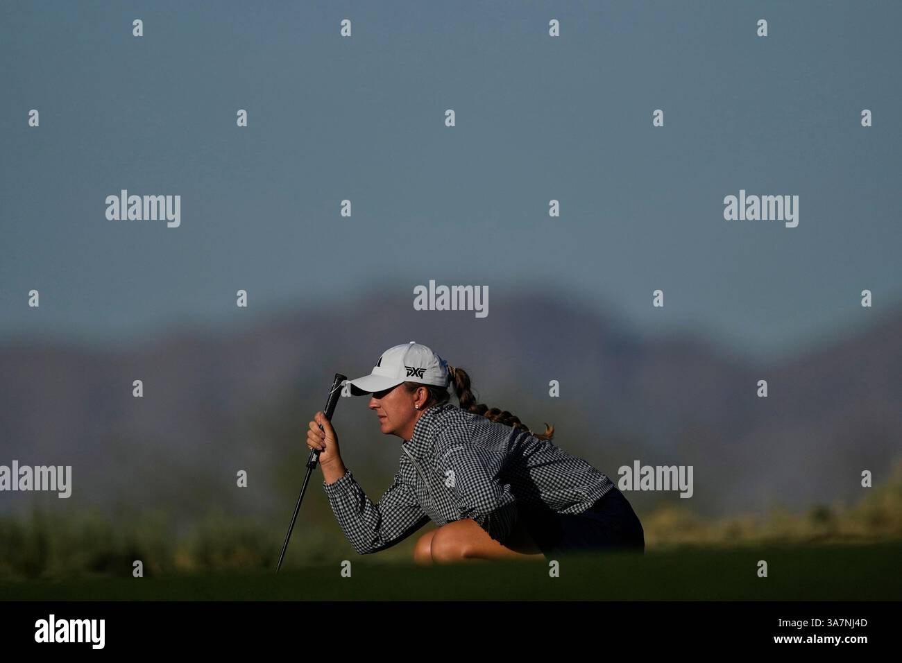Linnea Strom lines up her shot on the first green during the first ...