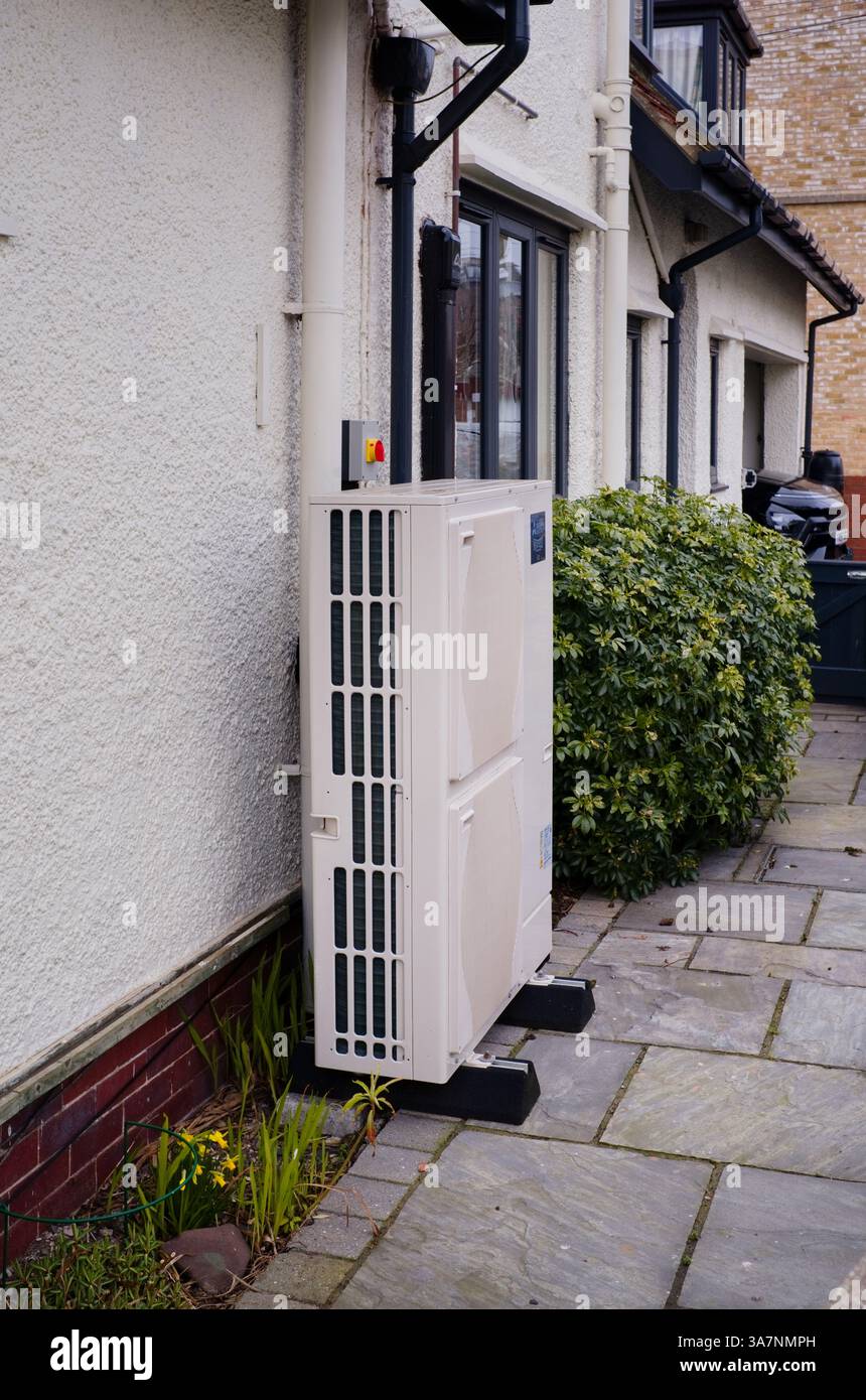 Heat pump installation outside a house in Filey Stock Photo - Alamy