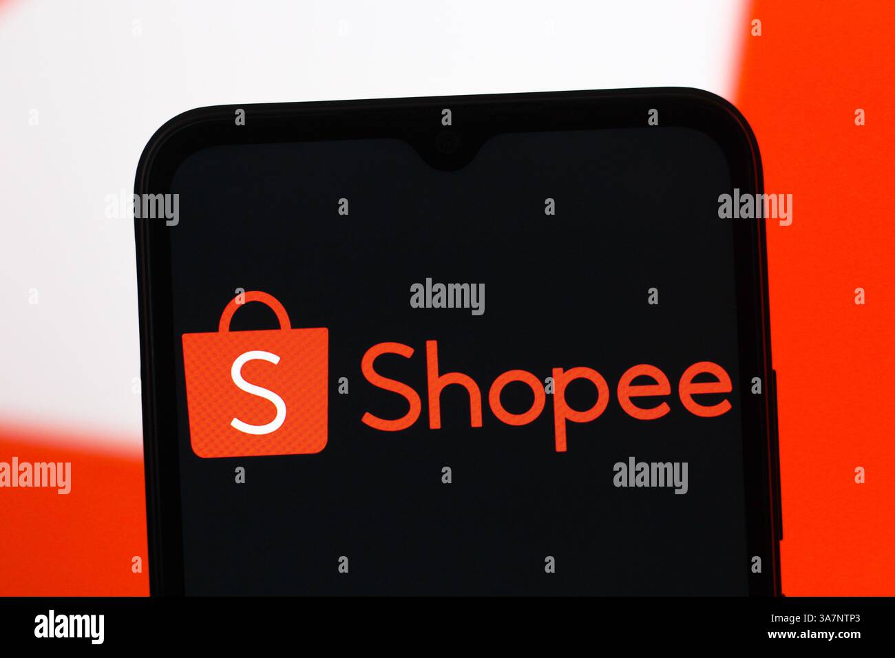 In this photo illustration, the Shopee logo is seen displayed on a ...