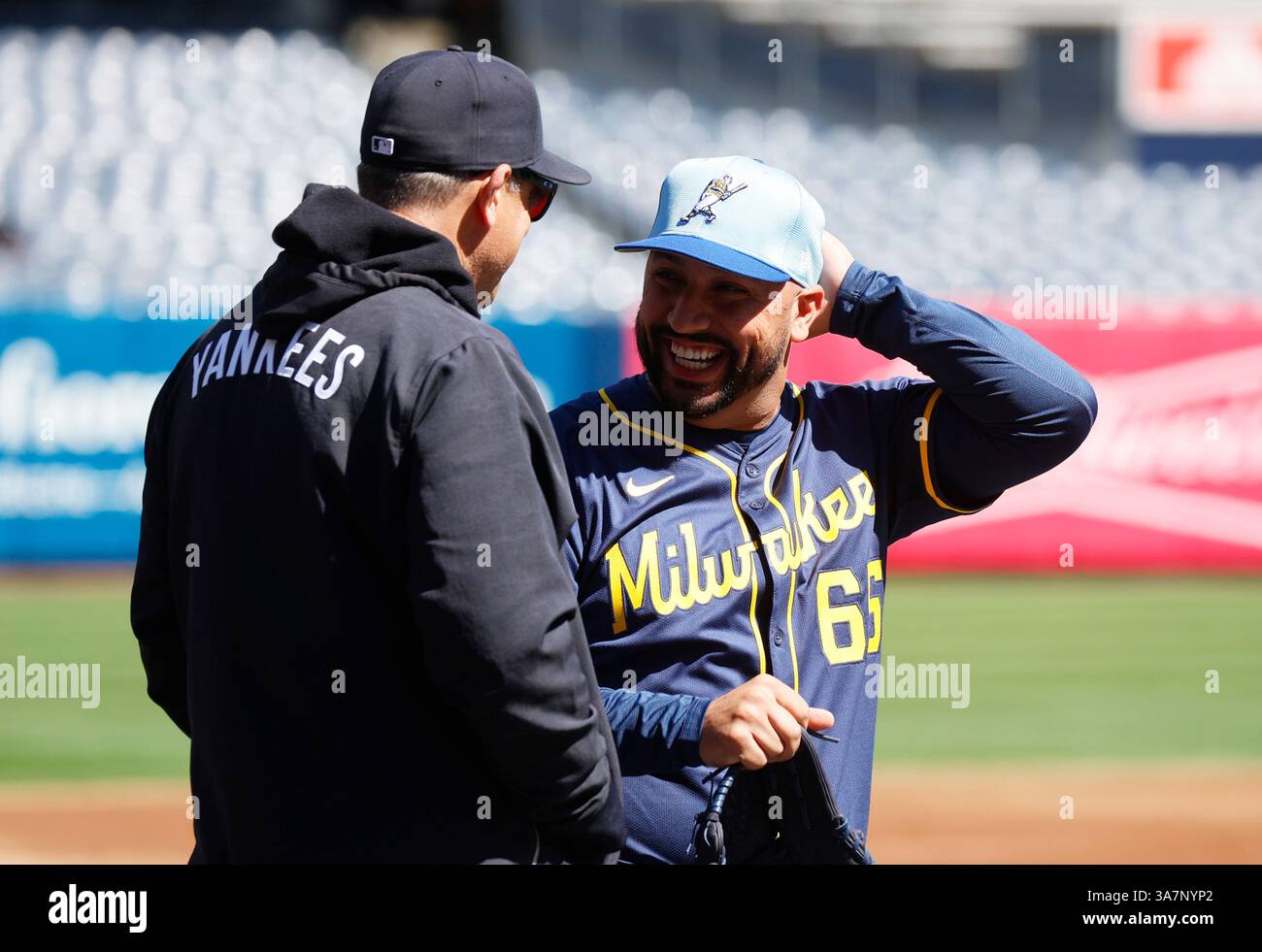 New York Yankees manager Aaron Boone and Milwaukee Brewers Nestor ...