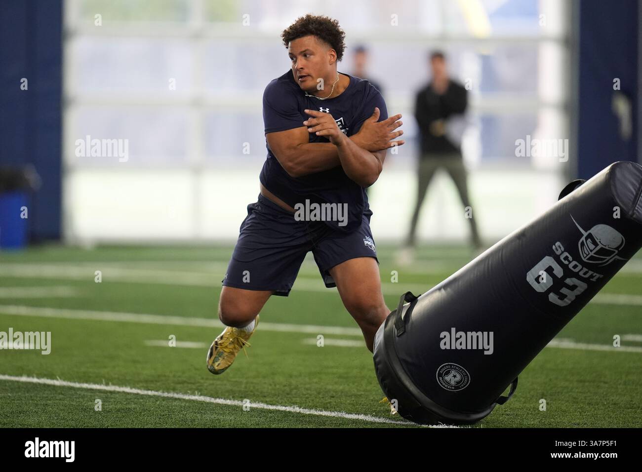 Notre Dame defensive lineman Howard Cross III (56) runs a drill during ...