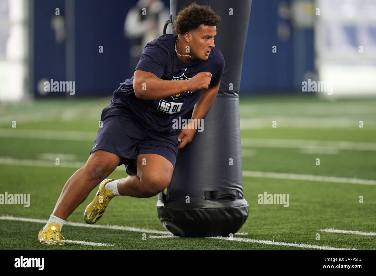 Notre Dame defensive lineman Howard Cross III (56) runs a drill during ...